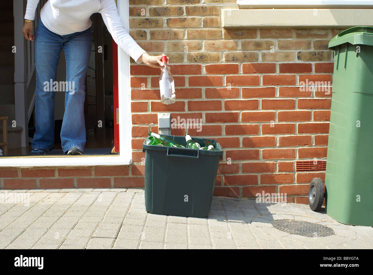 Putting rubbish bin out hi-res stock photography and images - Alamy