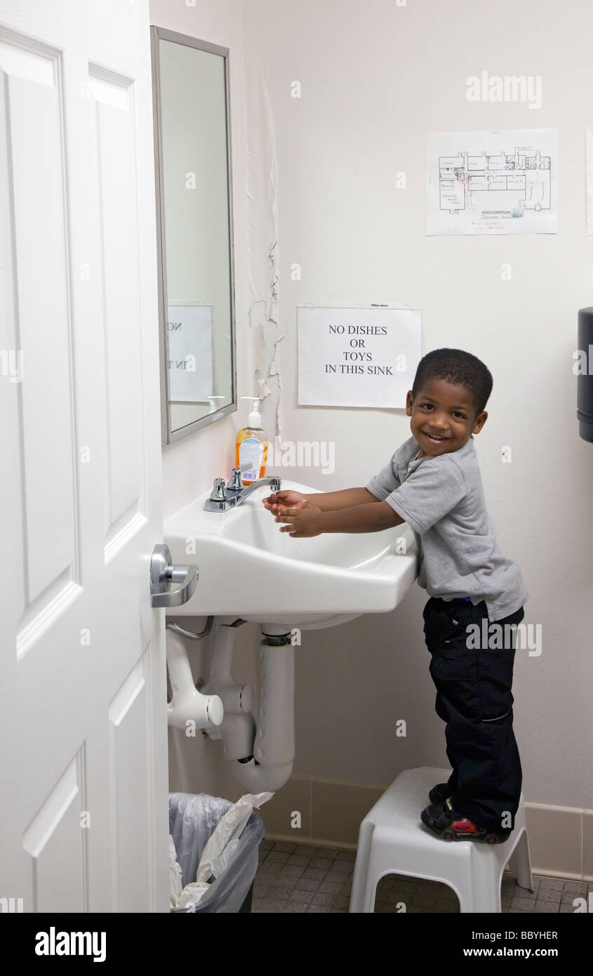 Washing hands african child hi-res stock photography and images - Alamy