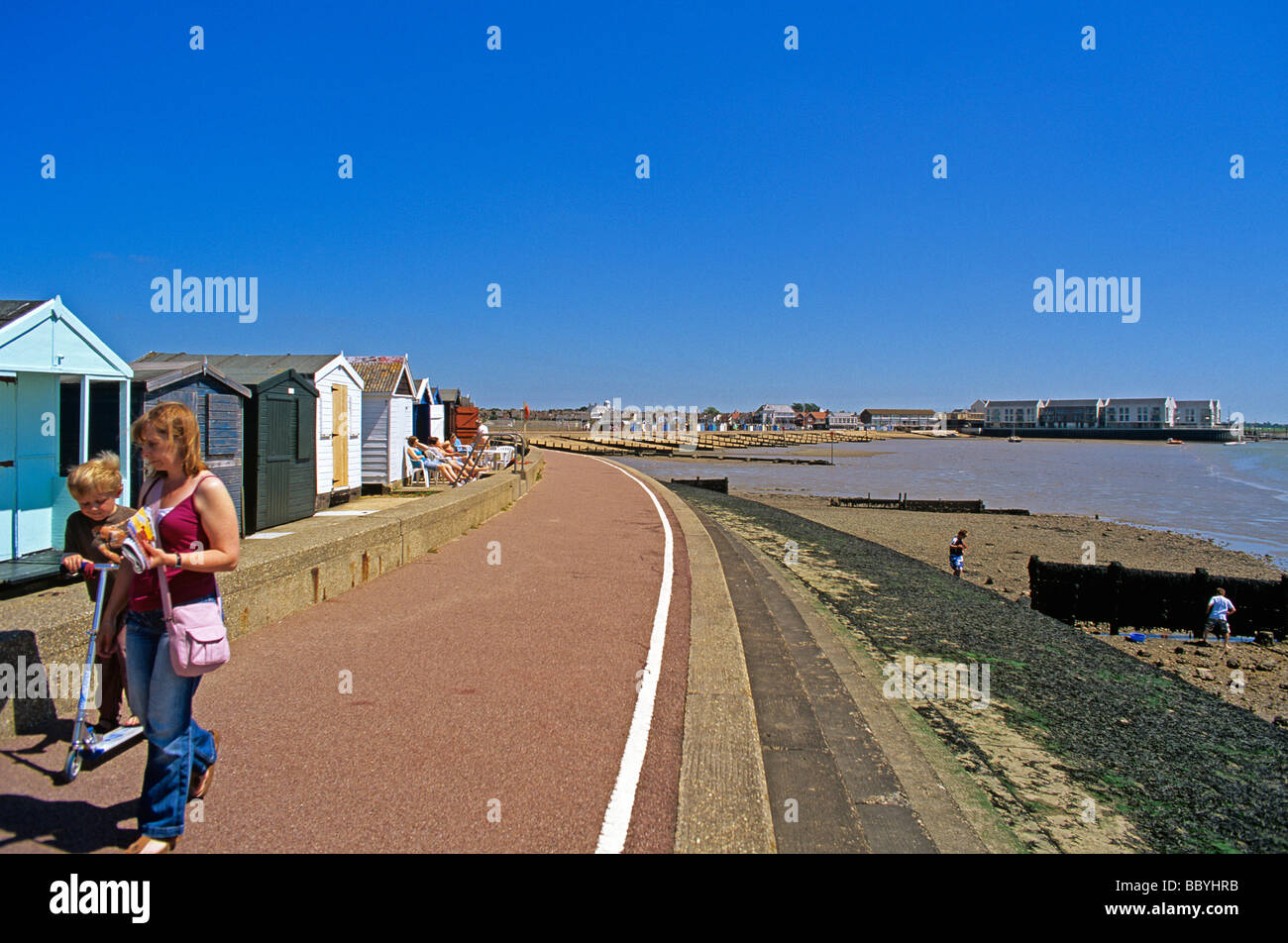 Brightlingsea beach huts and promenade Stock Photo - Alamy