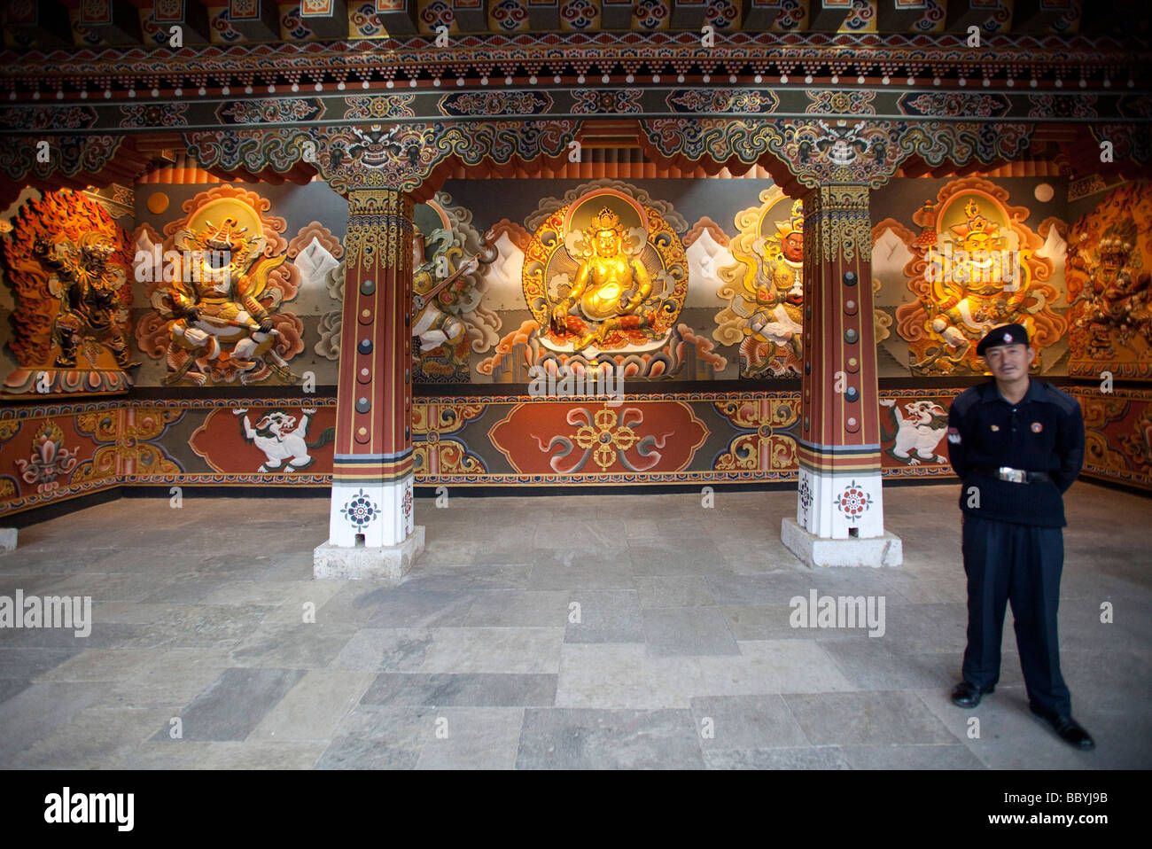 Gold Buddha and Paintings with Guard in Tashi Chho Dzong ...
