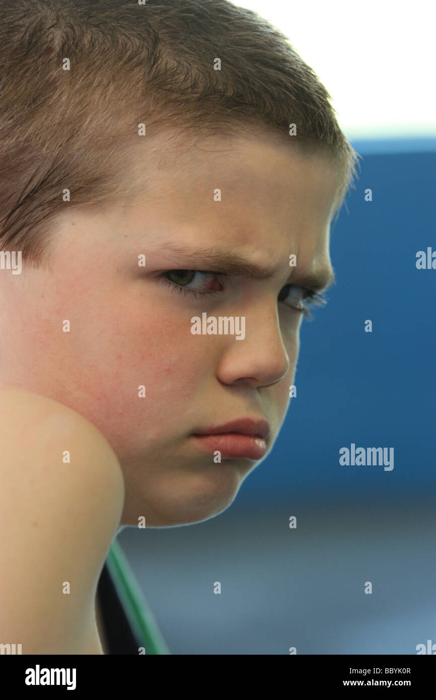 Profile of an angry boy Stock Photo - Alamy
