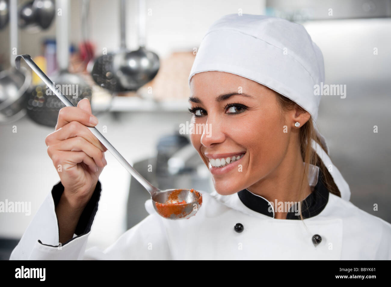 Female chef tasting sauce hi-res stock photography and images - Alamy