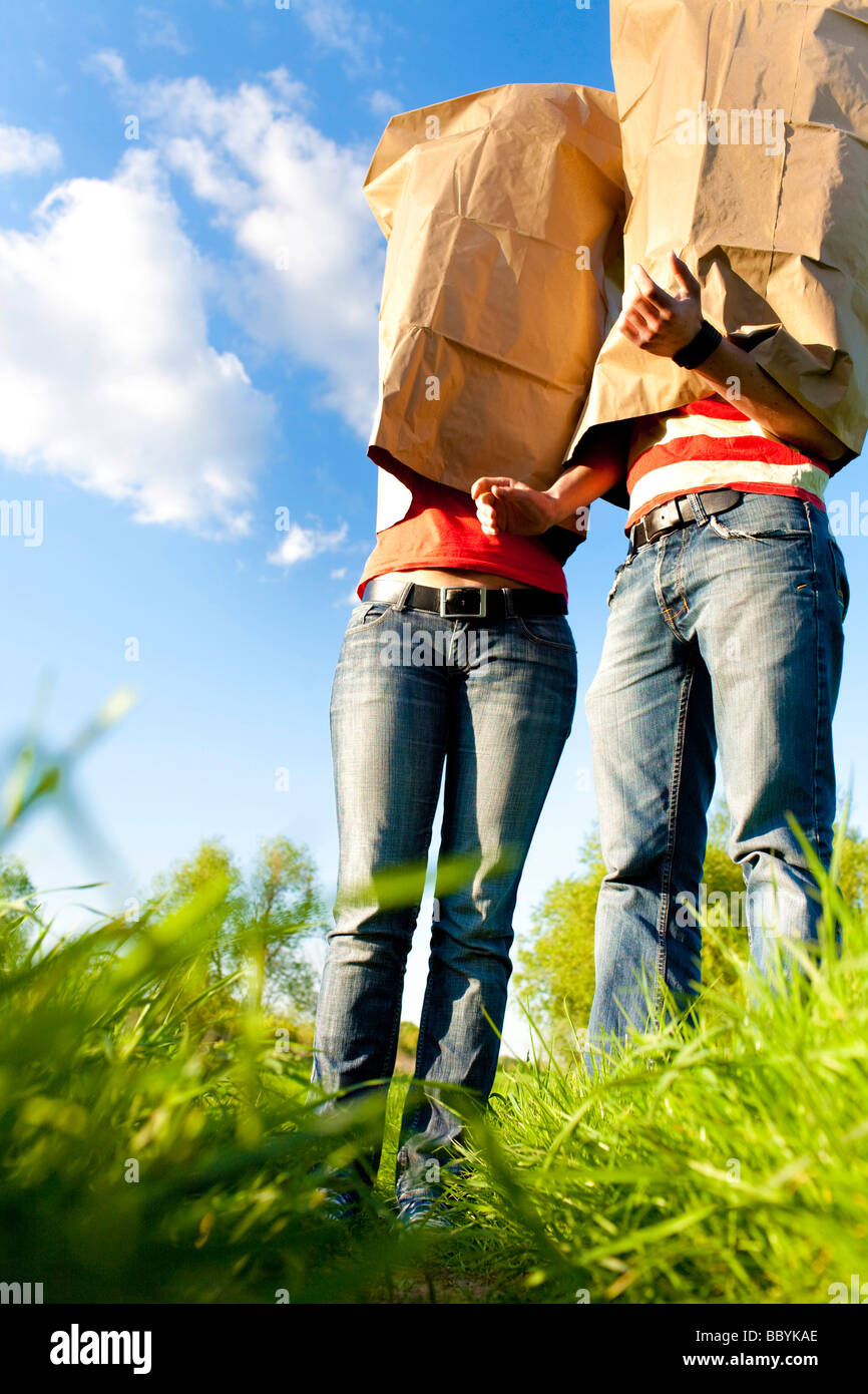 Young couple wearing sacks Stock Photo - Alamy
