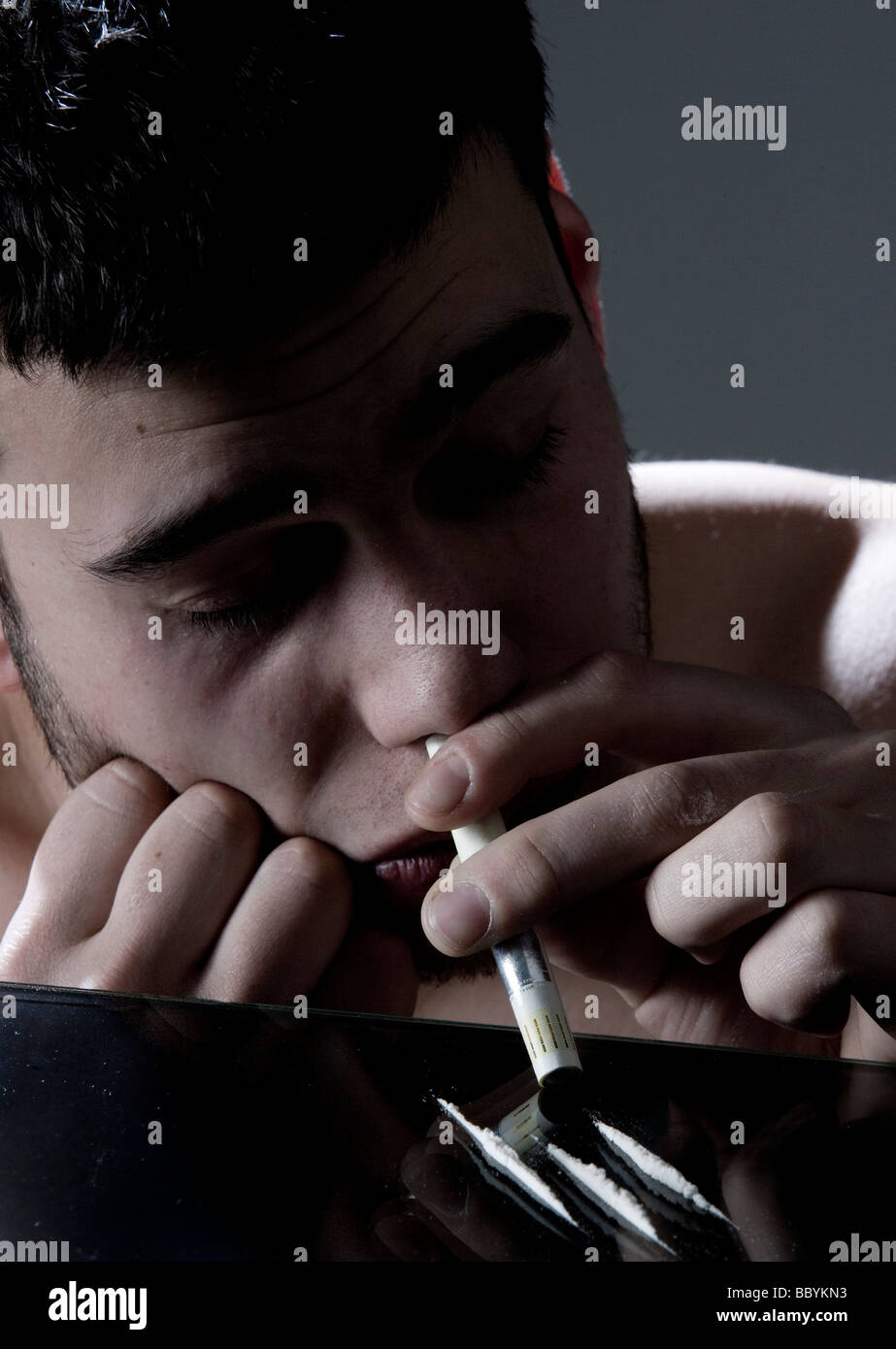 Male junkie sniffing line hi-res stock photography and images - Alamy