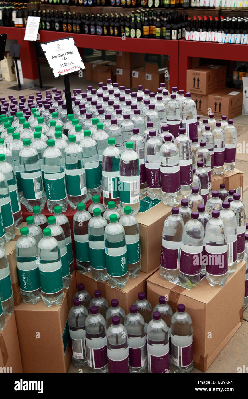 A display of bottled water in a retail store Stock Photo - Alamy