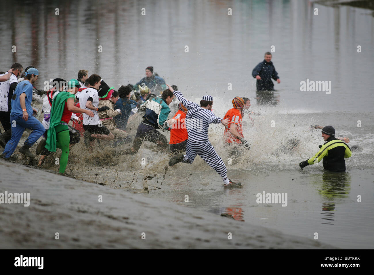 The start of the Mad Maldon Mud Race held in the river Blackwater at ...