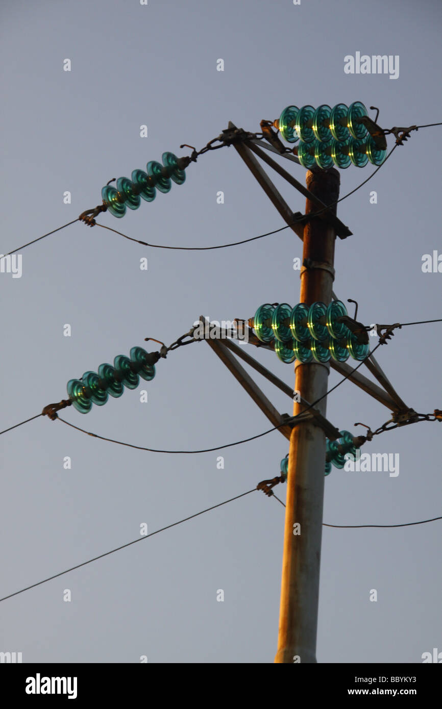 Power lines on iron pole Stock Photo - Alamy