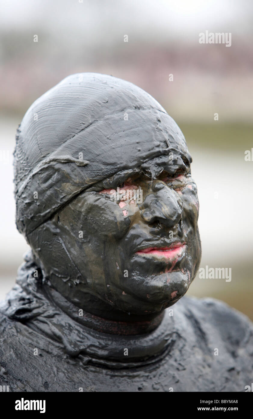 A muddy contestant after the Mad Maldon Mud Race held in the river ...