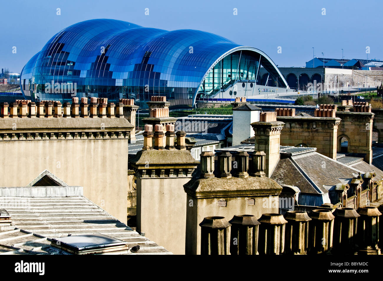 The Sage, Gateshead, viewed across quaysaide chimney stacks in ...