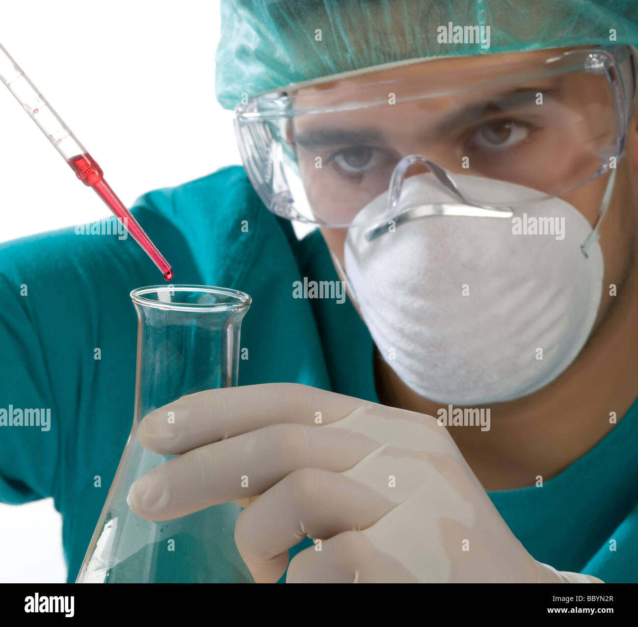Scientist taking a probe in a labor scene with testtubes and beaker ...