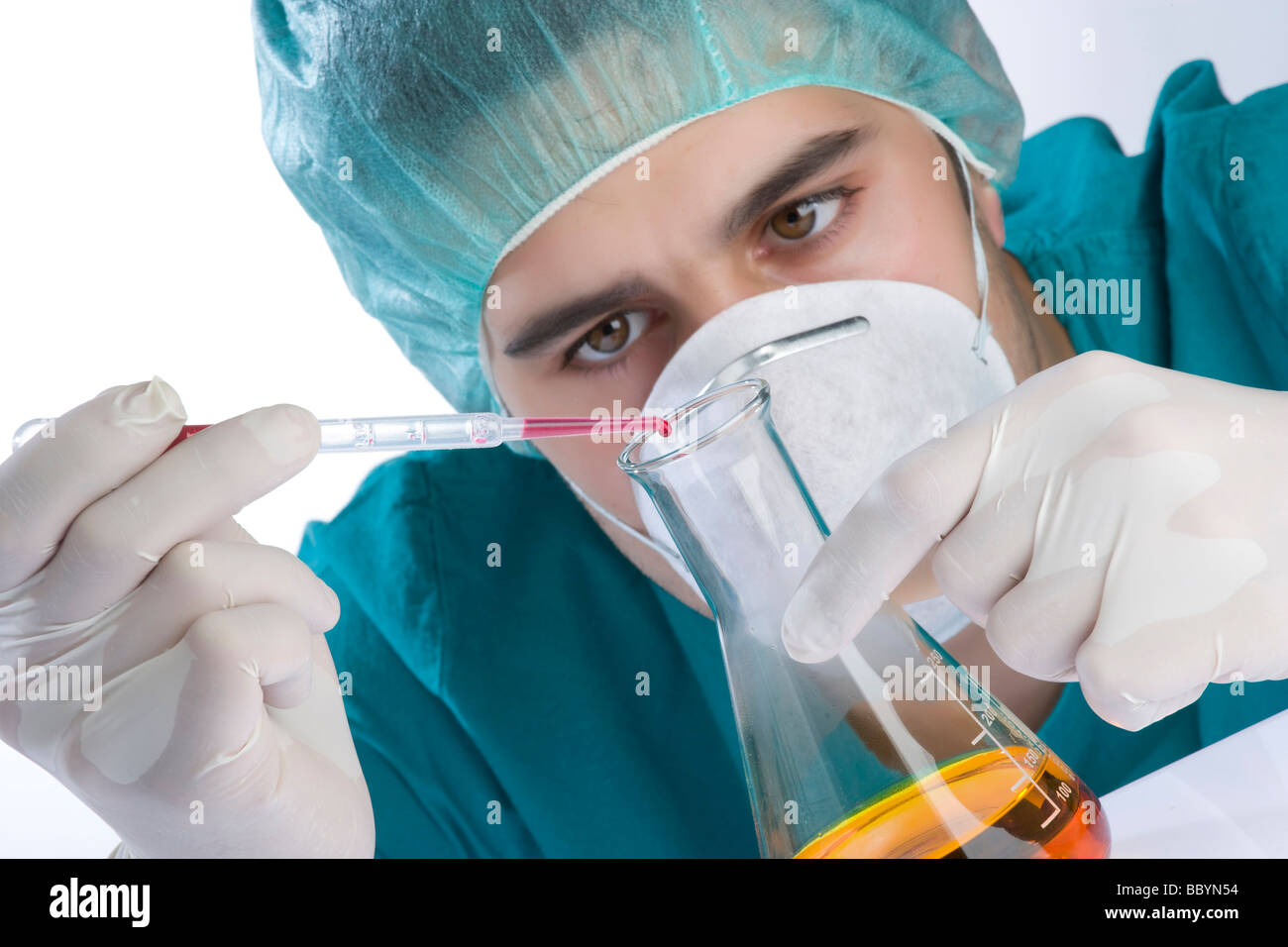 Scientist taking a probe in a labor scene with testtubes and beaker ...