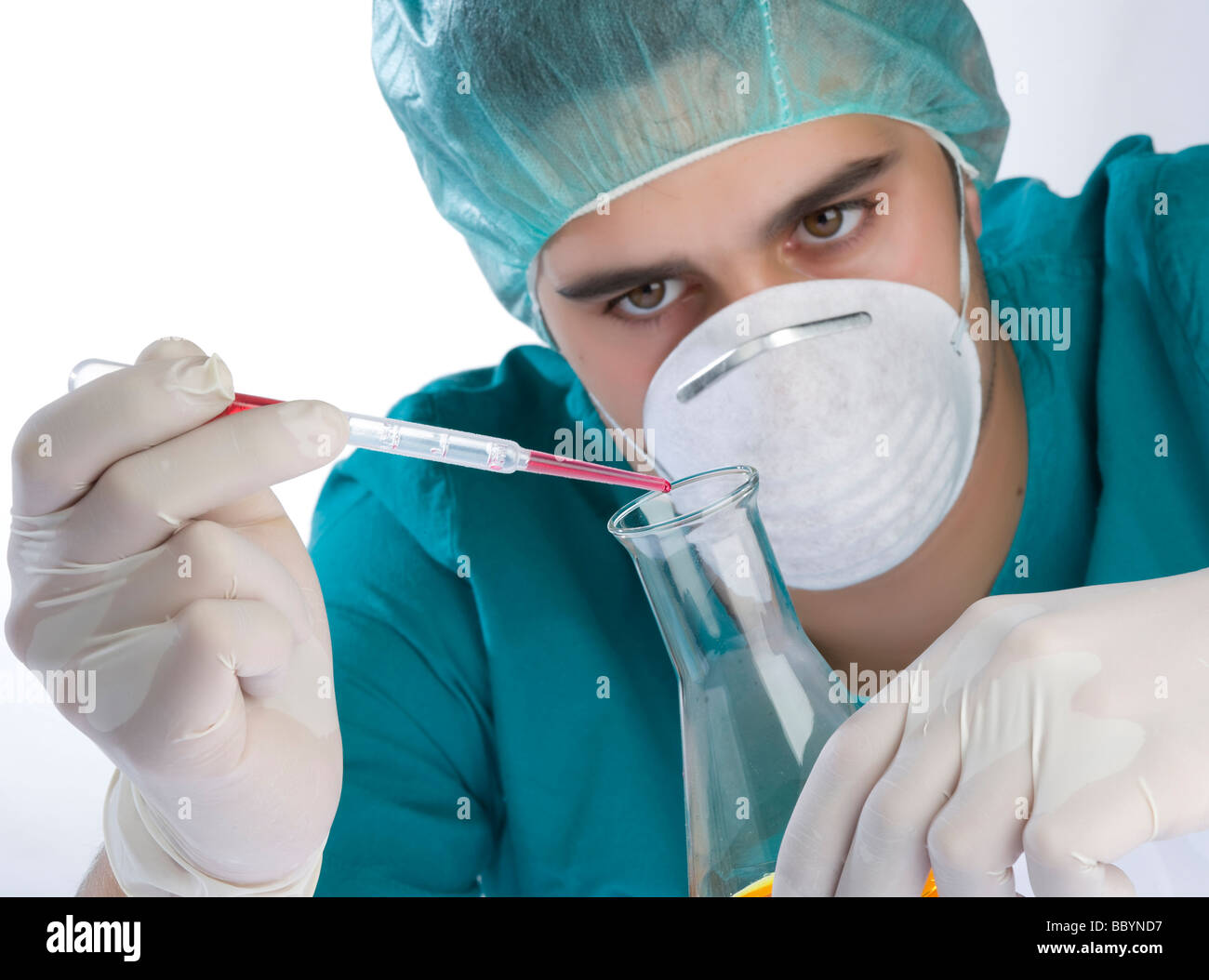 Scientist taking a probe in a labor scene with testtubes and beaker ...