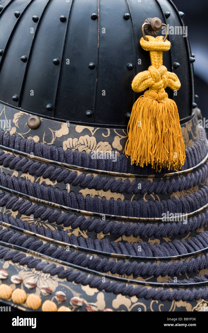 Detail close-up of a Japanese samurai warrior's armor called a "kabuto ...