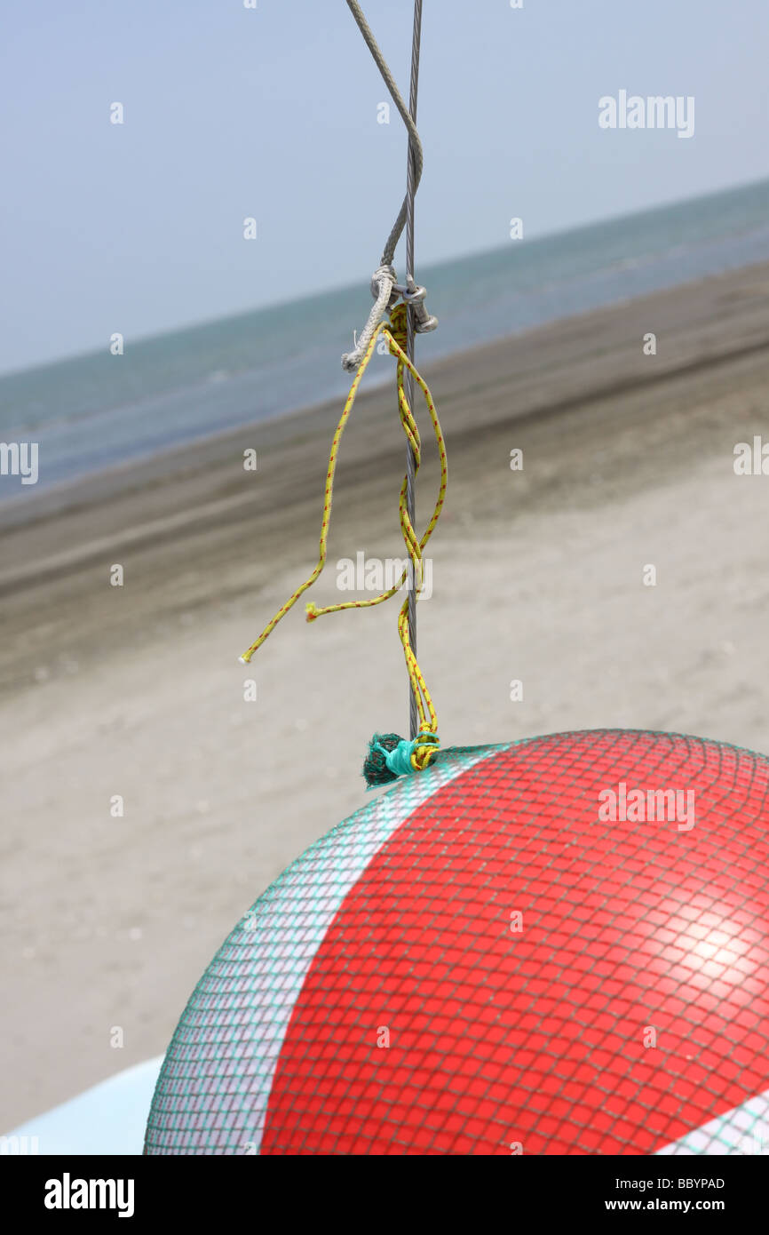floating ball from a small sail boat on a beach Stock Photo - Alamy