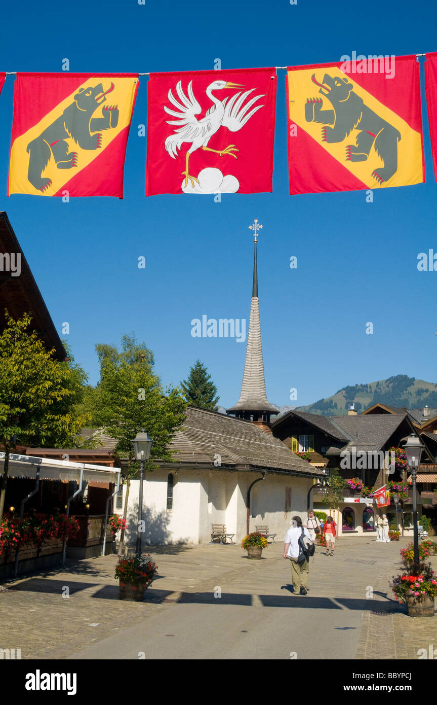 Gstaad main street and St Nicholas chapel Stock Photo - Alamy