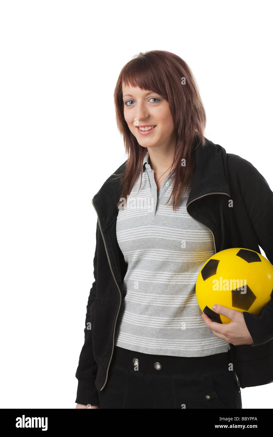 Smiling teenager girl holding yellow ball isoalted on white Stock Photo ...
