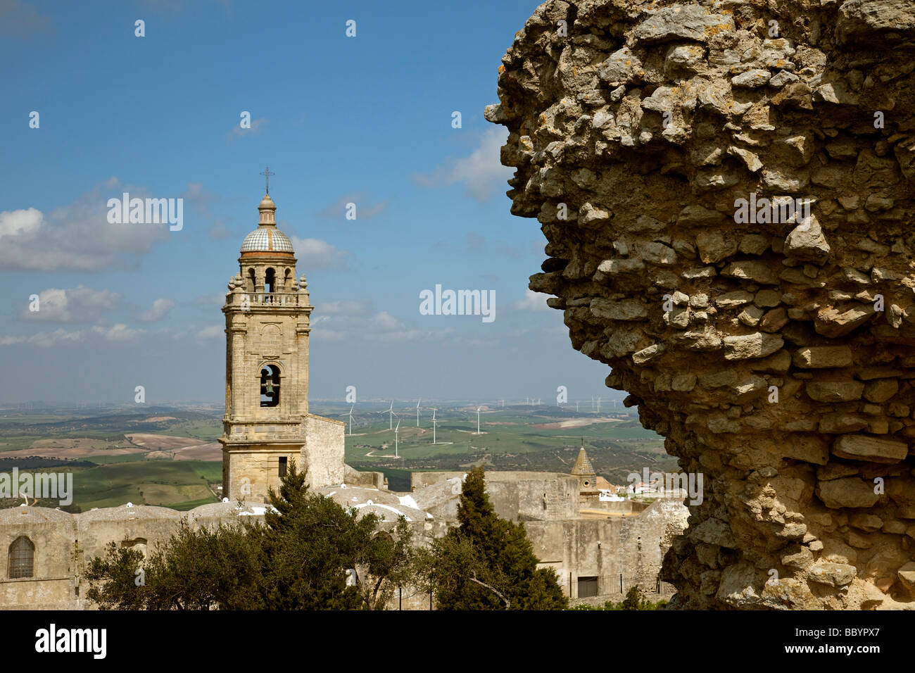 Santa Maria Church and ruins of the castle in the white village of ...