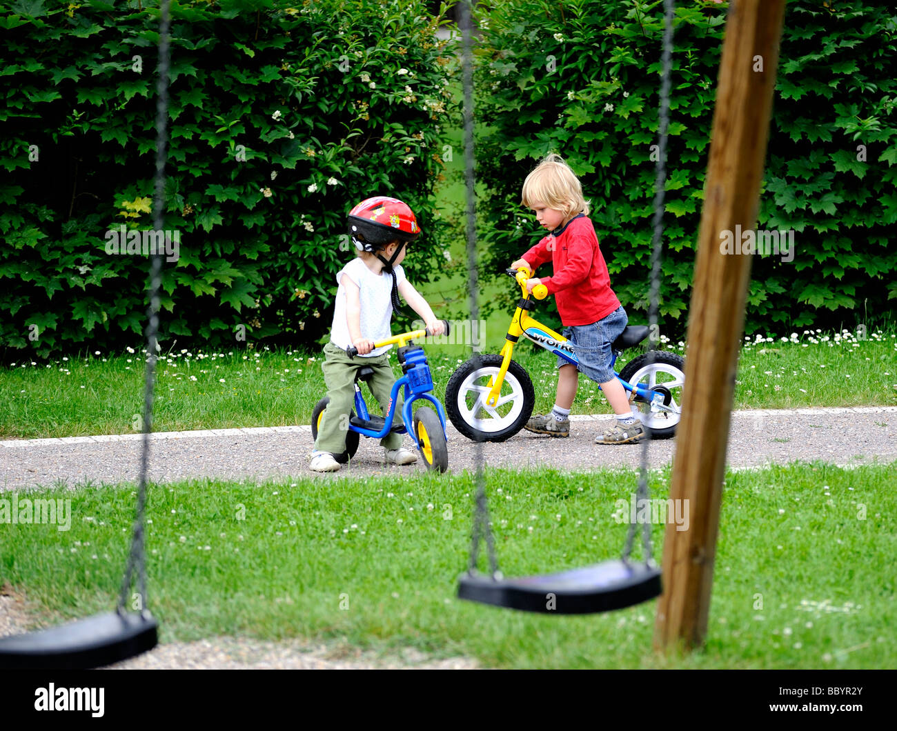 Little boy riding a bounce bicycle Stock Photo - Alamy