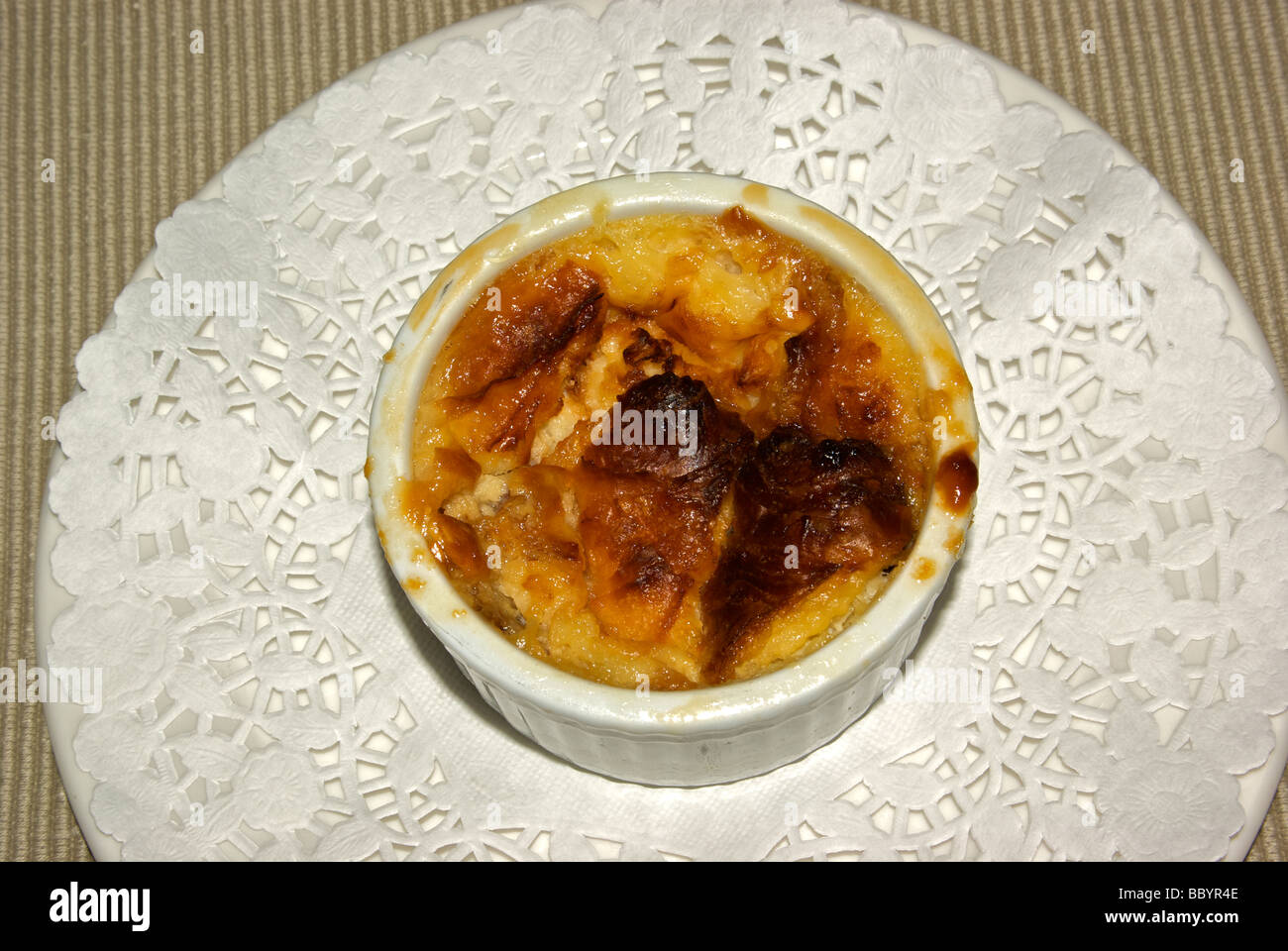 Crispy topped bread pudding comfort food dessert Stock Photo - Alamy