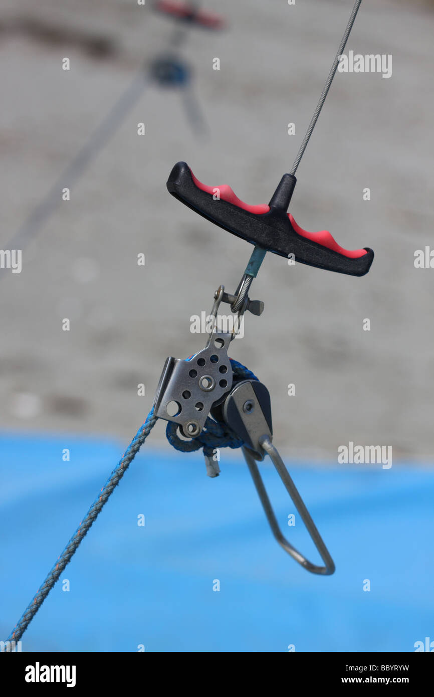 Hook of a trapeze of a sail boat on a beach Stock Photo - Alamy