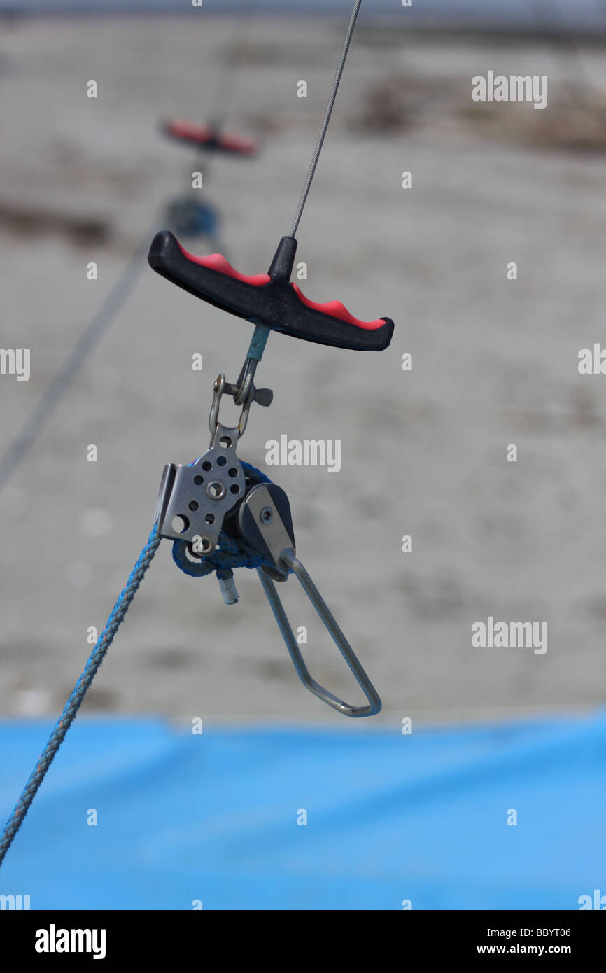 Hook of a trapeze of a sail boat on a beach Stock Photo - Alamy