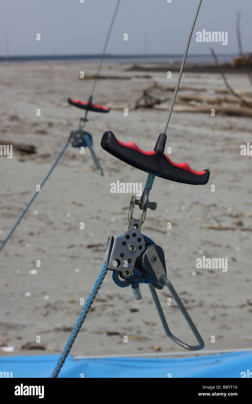 Hook of a trapeze of a sail boat on a beach Stock Photo - Alamy