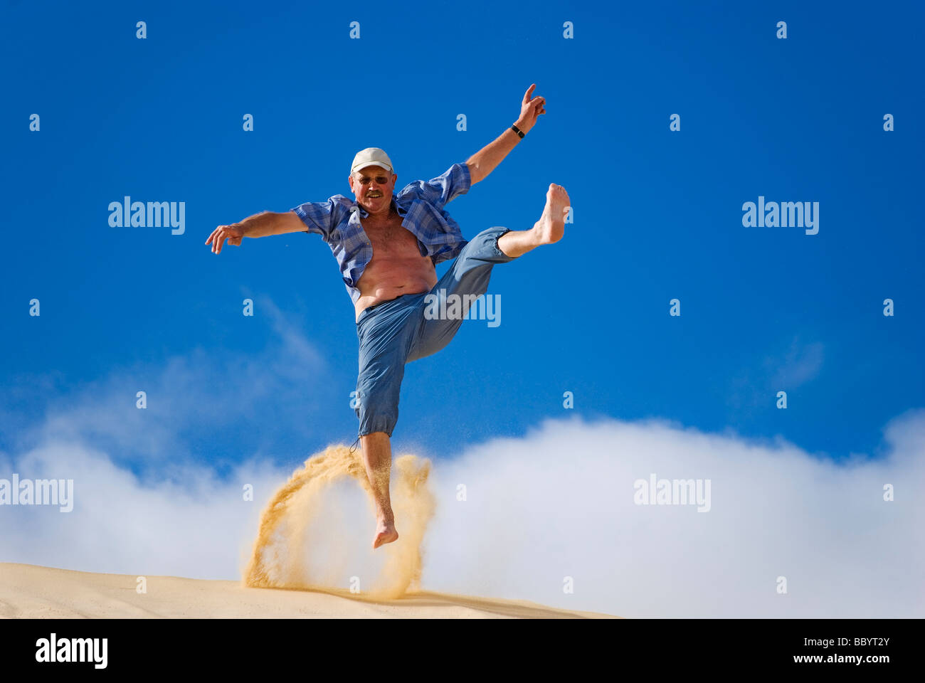Happy man jumping Stock Photo - Alamy