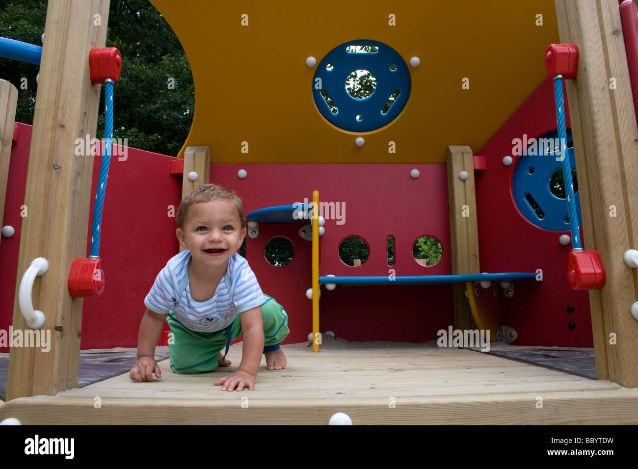 Happy toddler boy crawling hi-res stock photography and images - Alamy