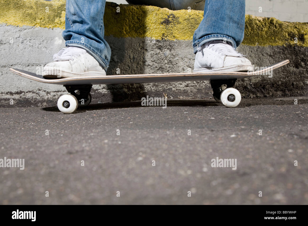 Feet with skateboard Stock Photo - Alamy