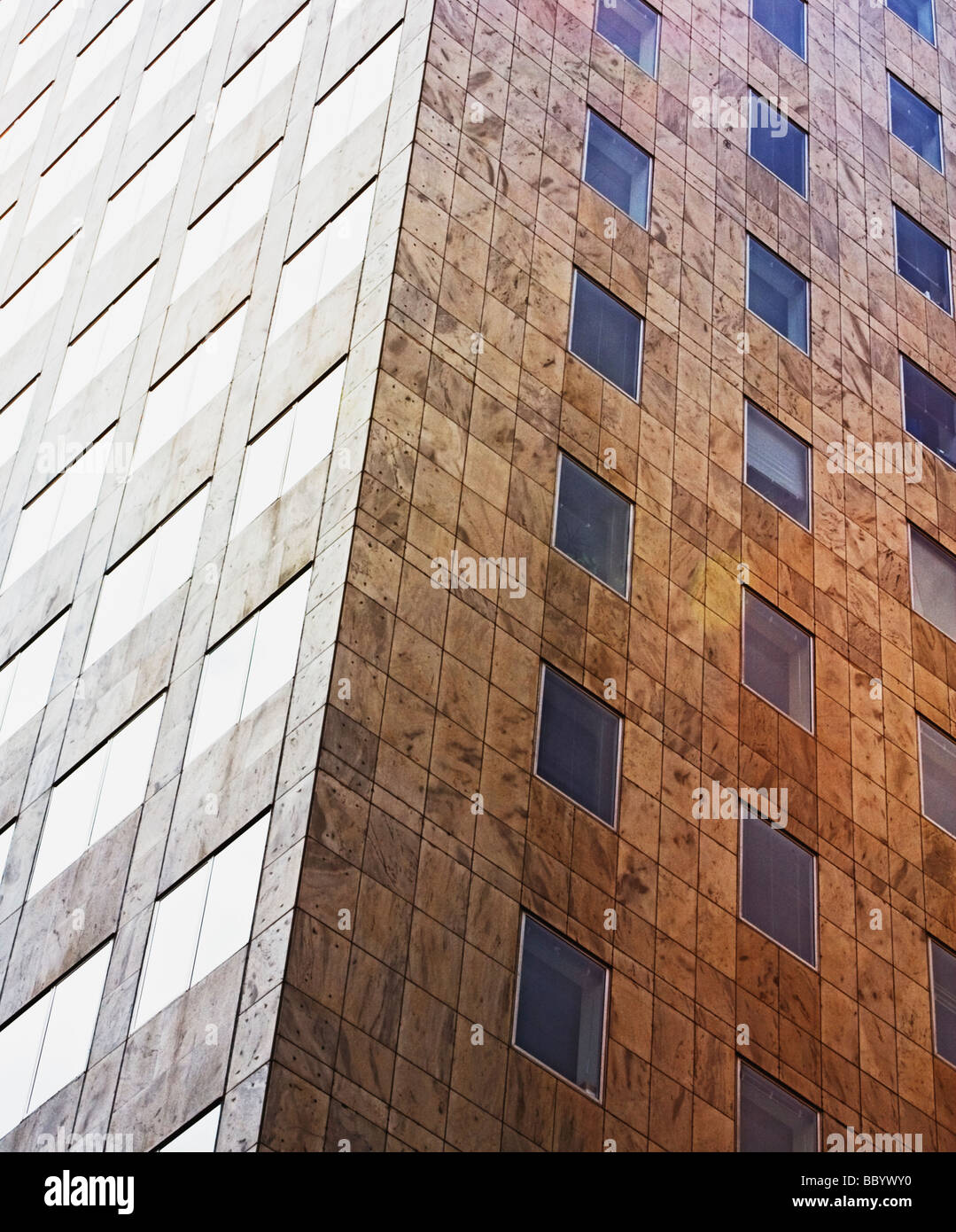 corner of brown stone skyscraper Stock Photo - Alamy