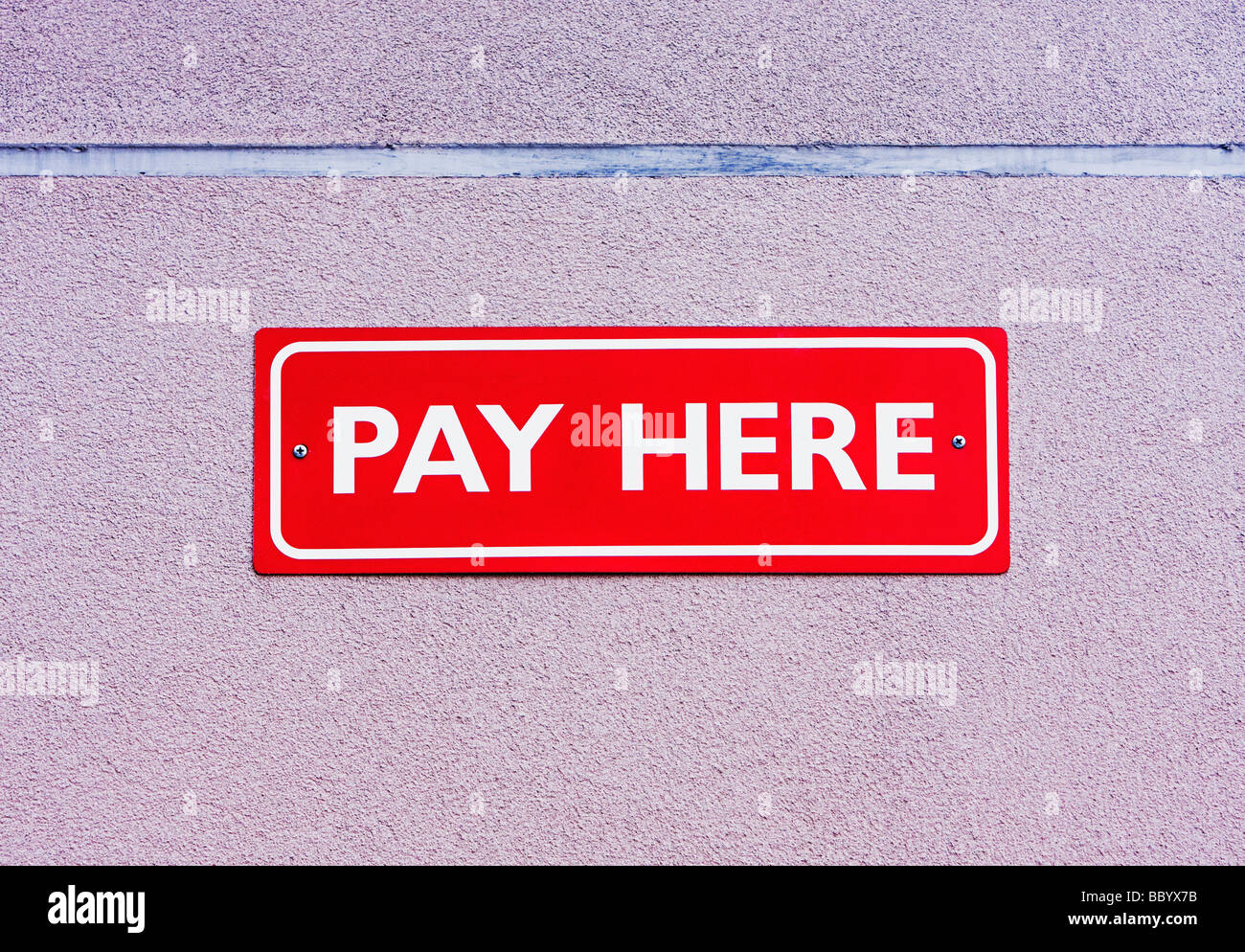 parking lot sign mounted on wall Stock Photo - Alamy