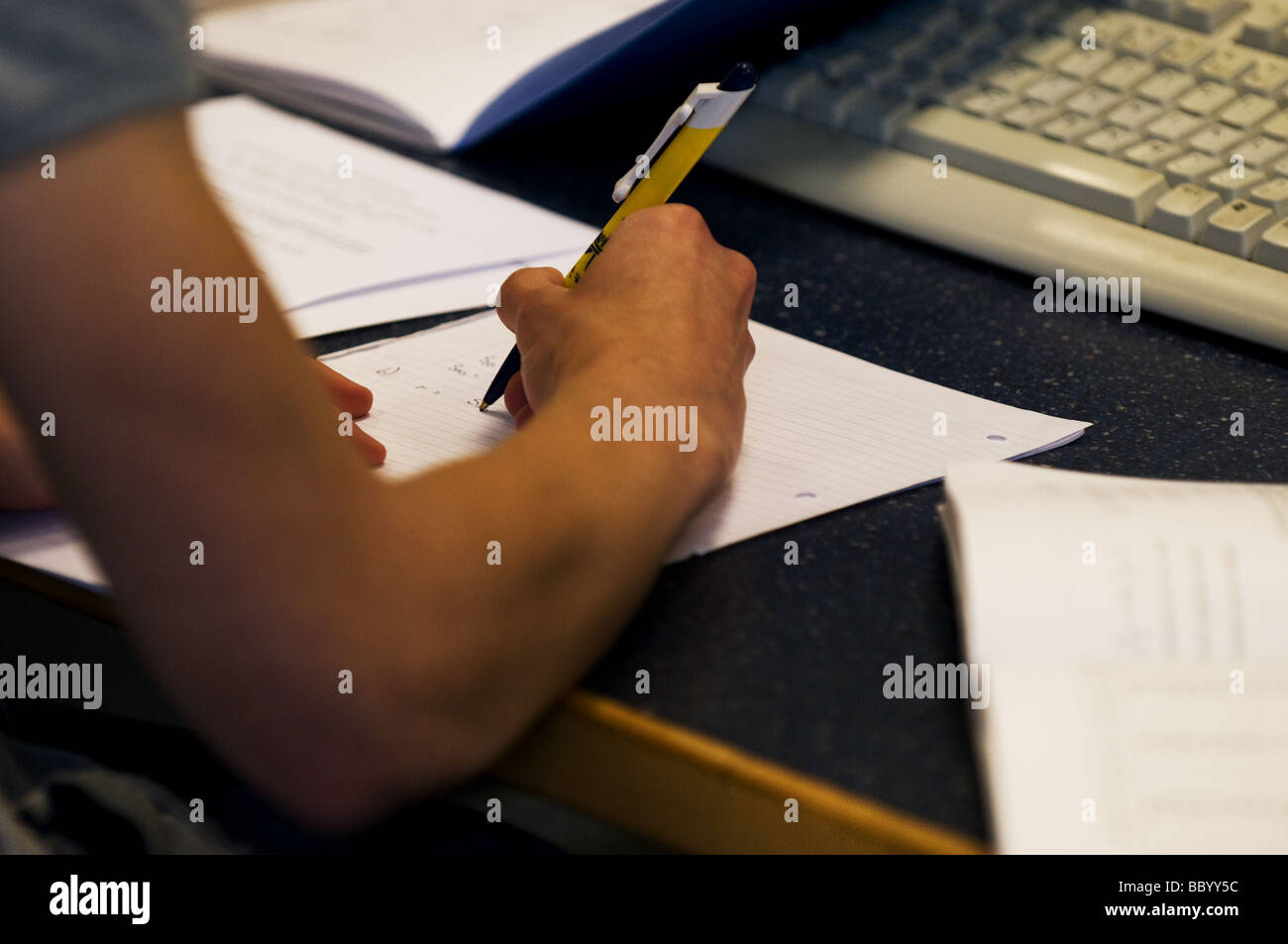 A student writing Stock Photo - Alamy