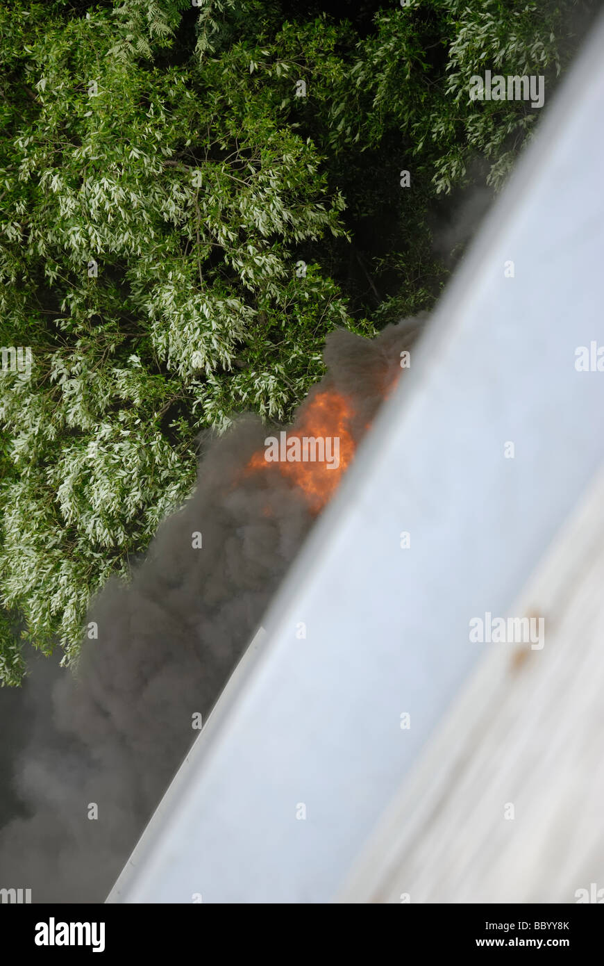 Fire with black smoke Top view from high level of living house Stock ...