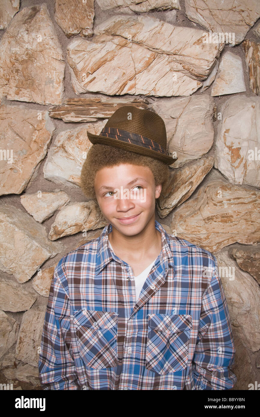Mixed race boy wearing fedora Stock Photo - Alamy