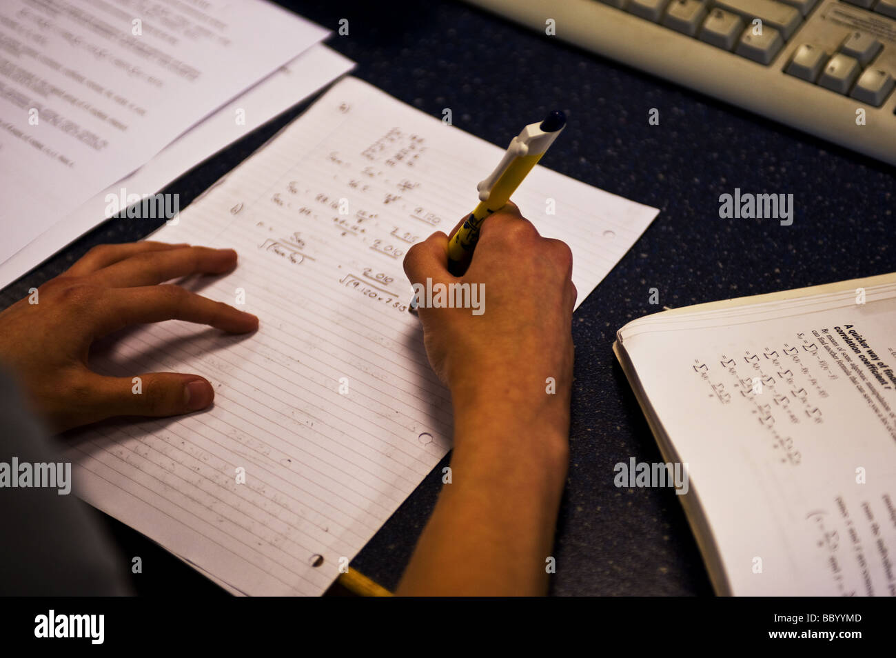 A student writing Stock Photo - Alamy