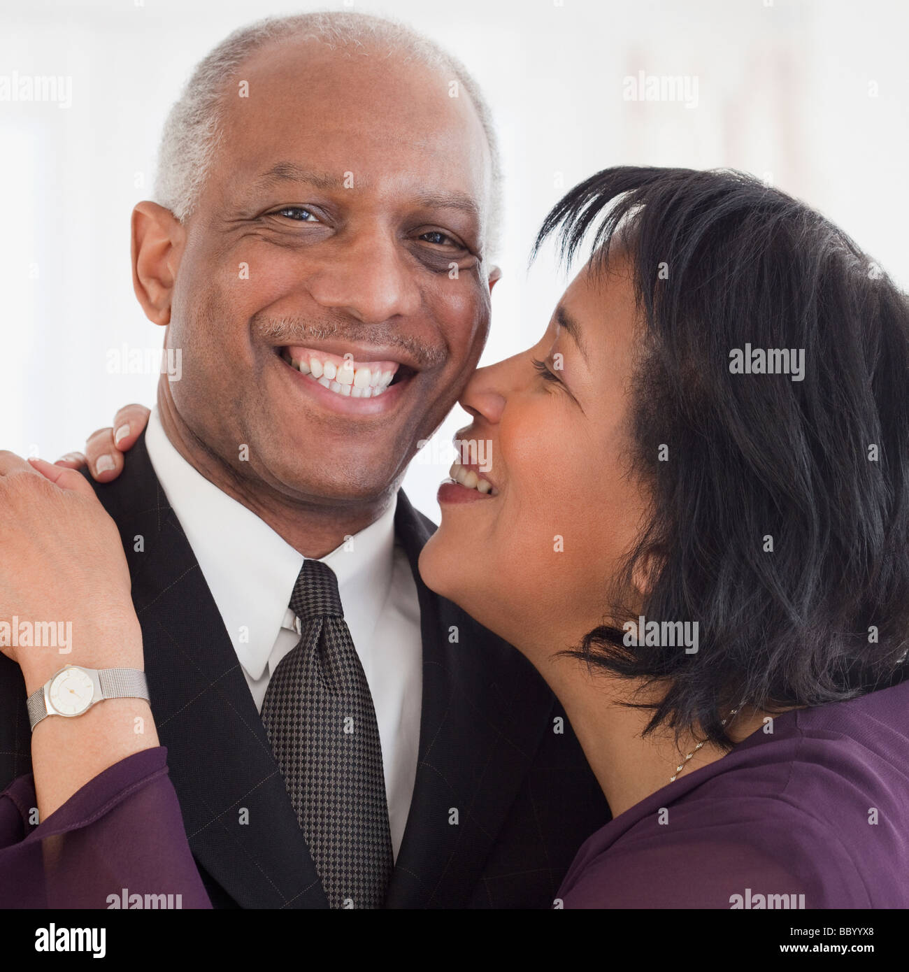 African couple hugging Stock Photo - Alamy