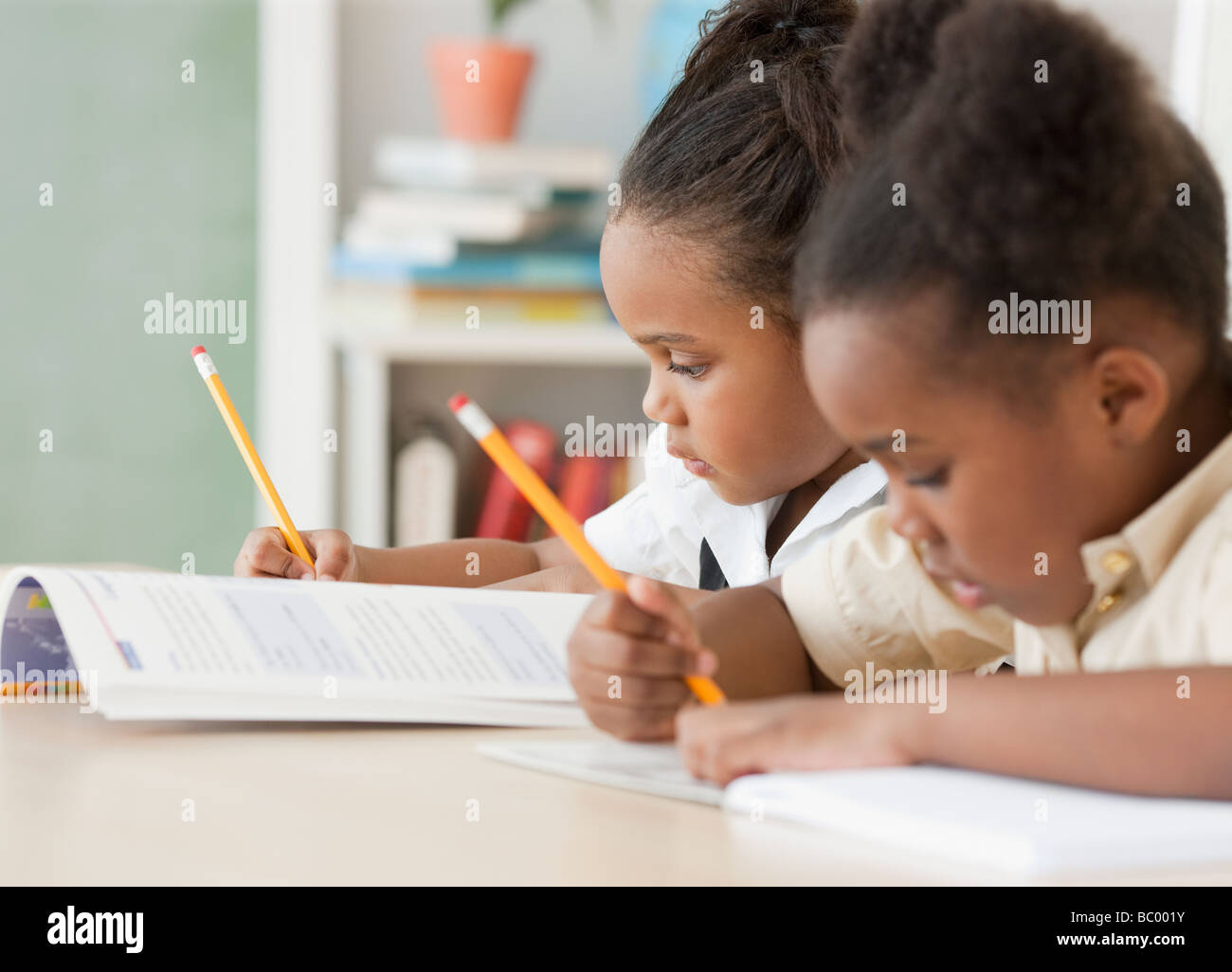 African girls doing homework Stock Photo - Alamy