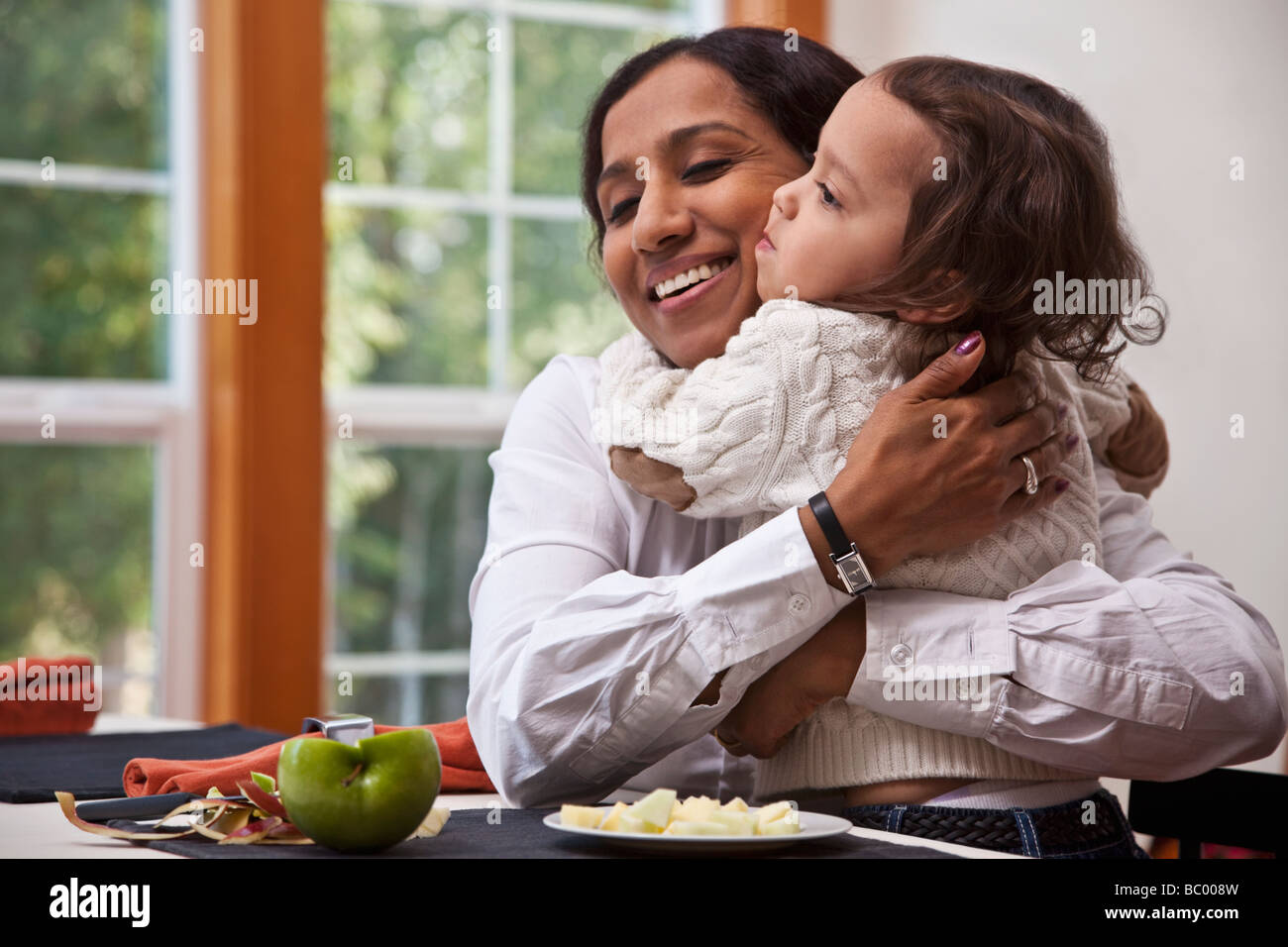 Indian daughter hugging mother hi-res stock photography and images - Alamy