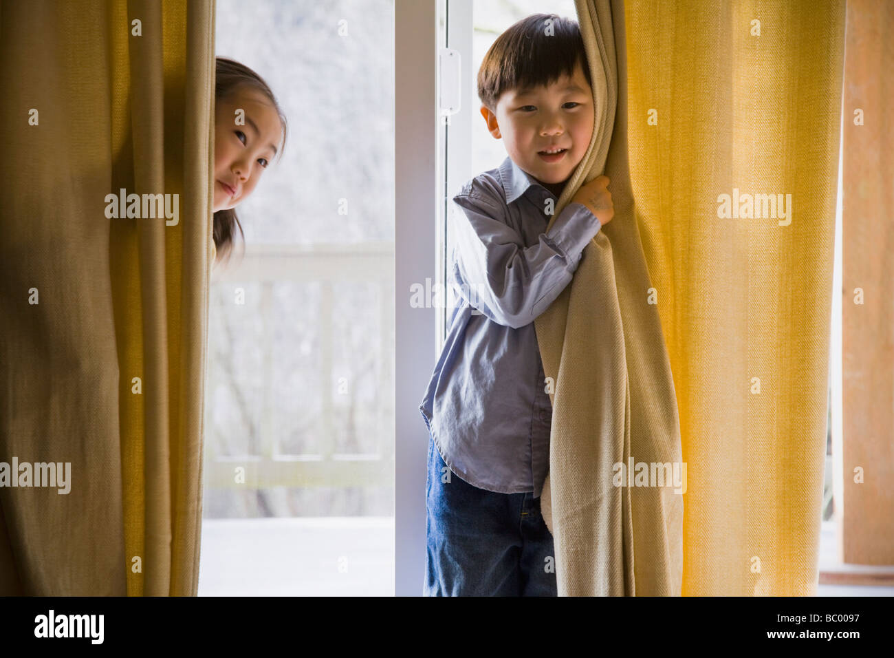 Korean children behind curtains Stock Photo - Alamy