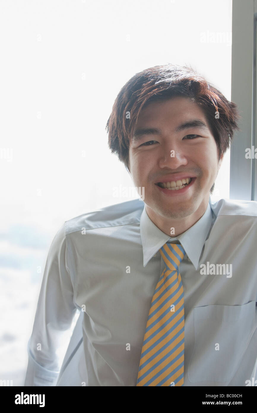Chinese businessman smiling Stock Photo - Alamy