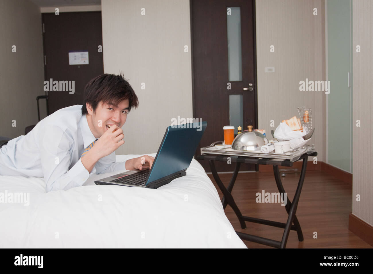 Businessman working in hotel room hi-res stock photography and images ...