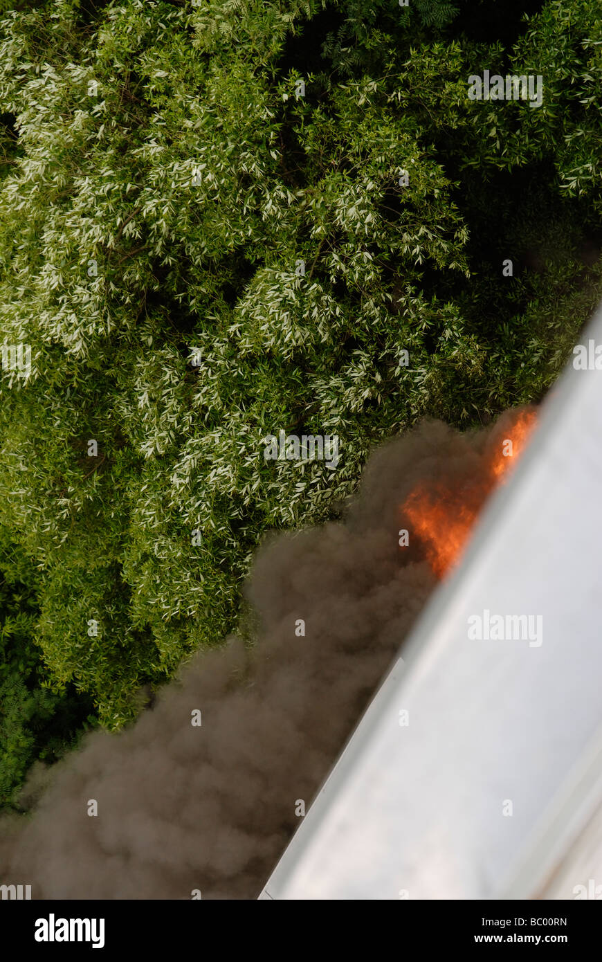 Fire with black smoke Top view from high level of living house Stock ...