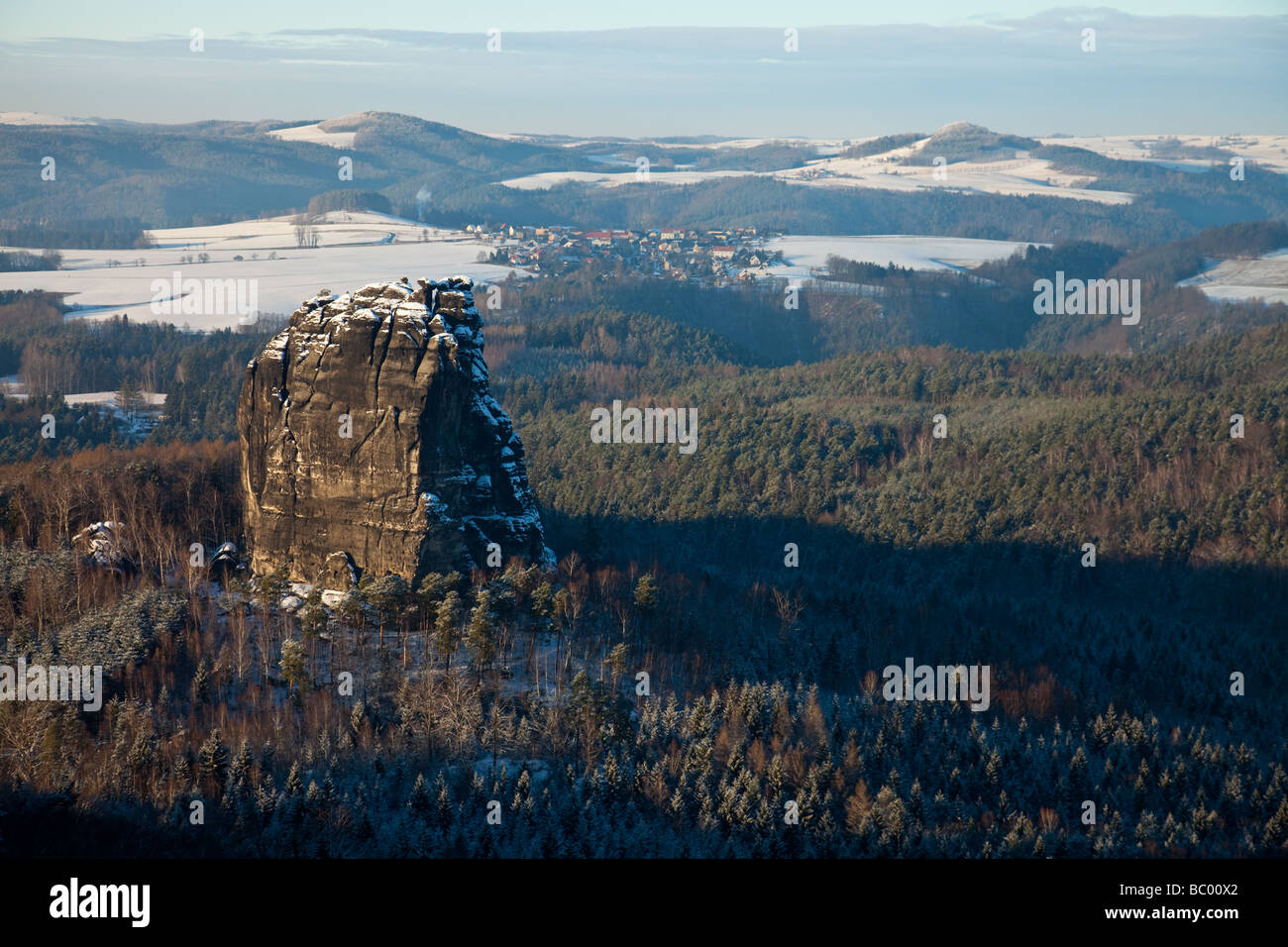 View to the rock massif of Falkenstein in a beautiful winter scenery in ...
