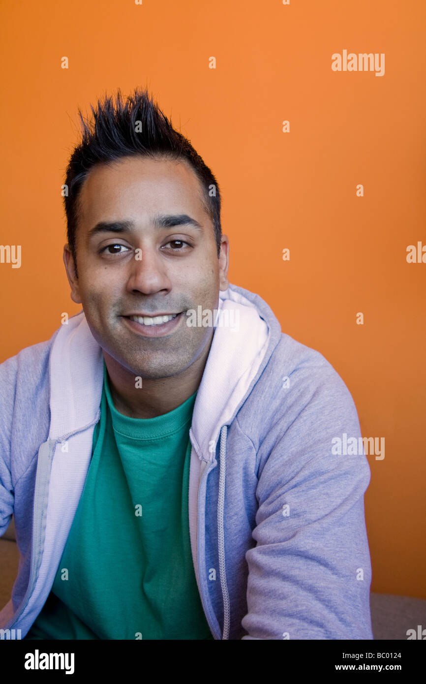 Smiling mixed race man Stock Photo - Alamy