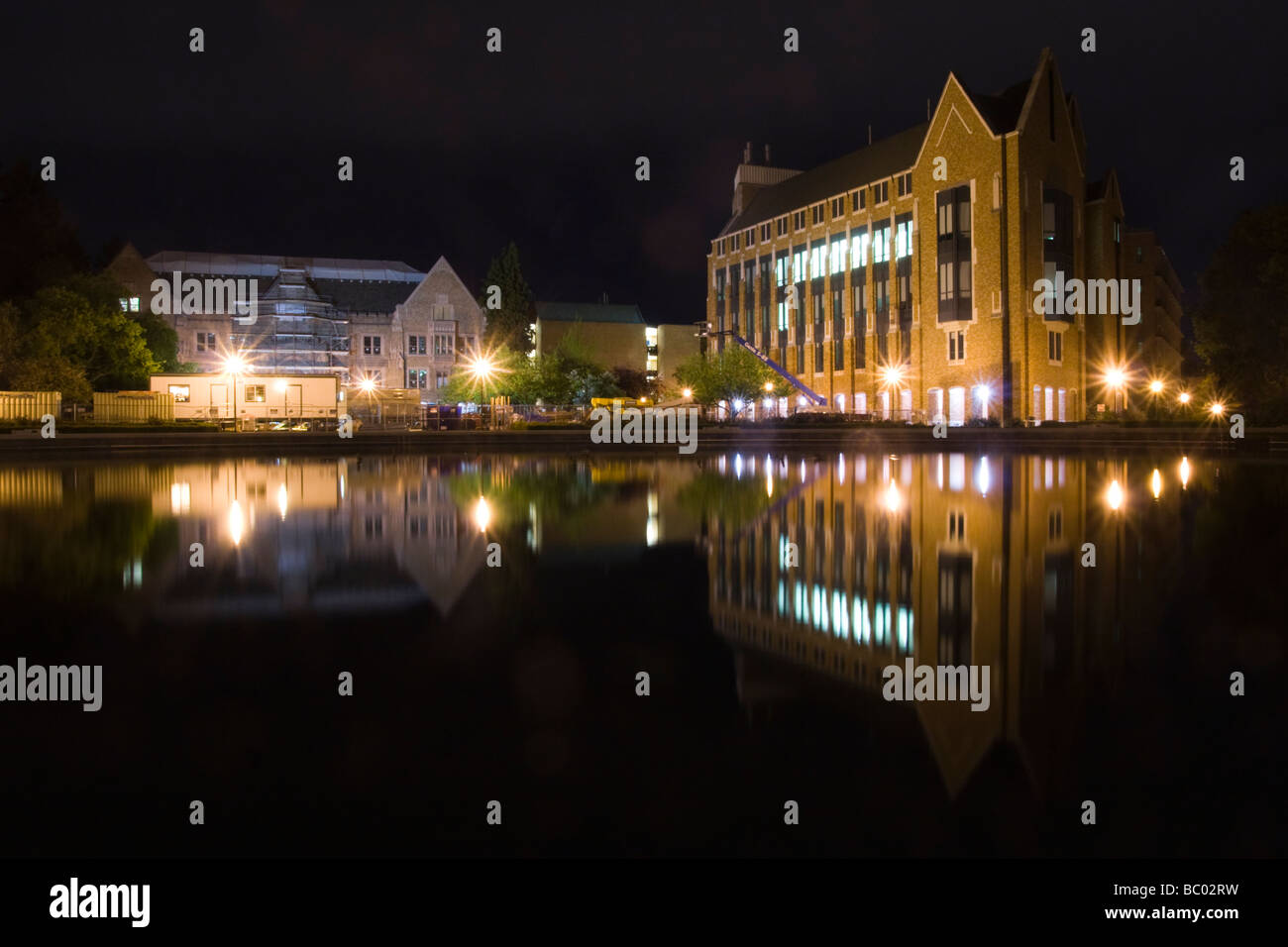Buildings reflected at night on the university of Washington campus in ...