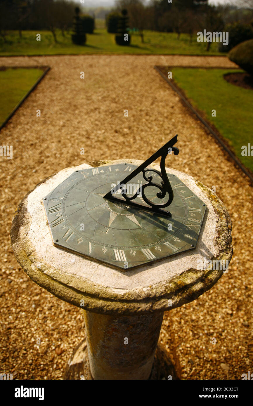 Pedestal,horizontal type sundial,made of brass and mounted on a stone ...