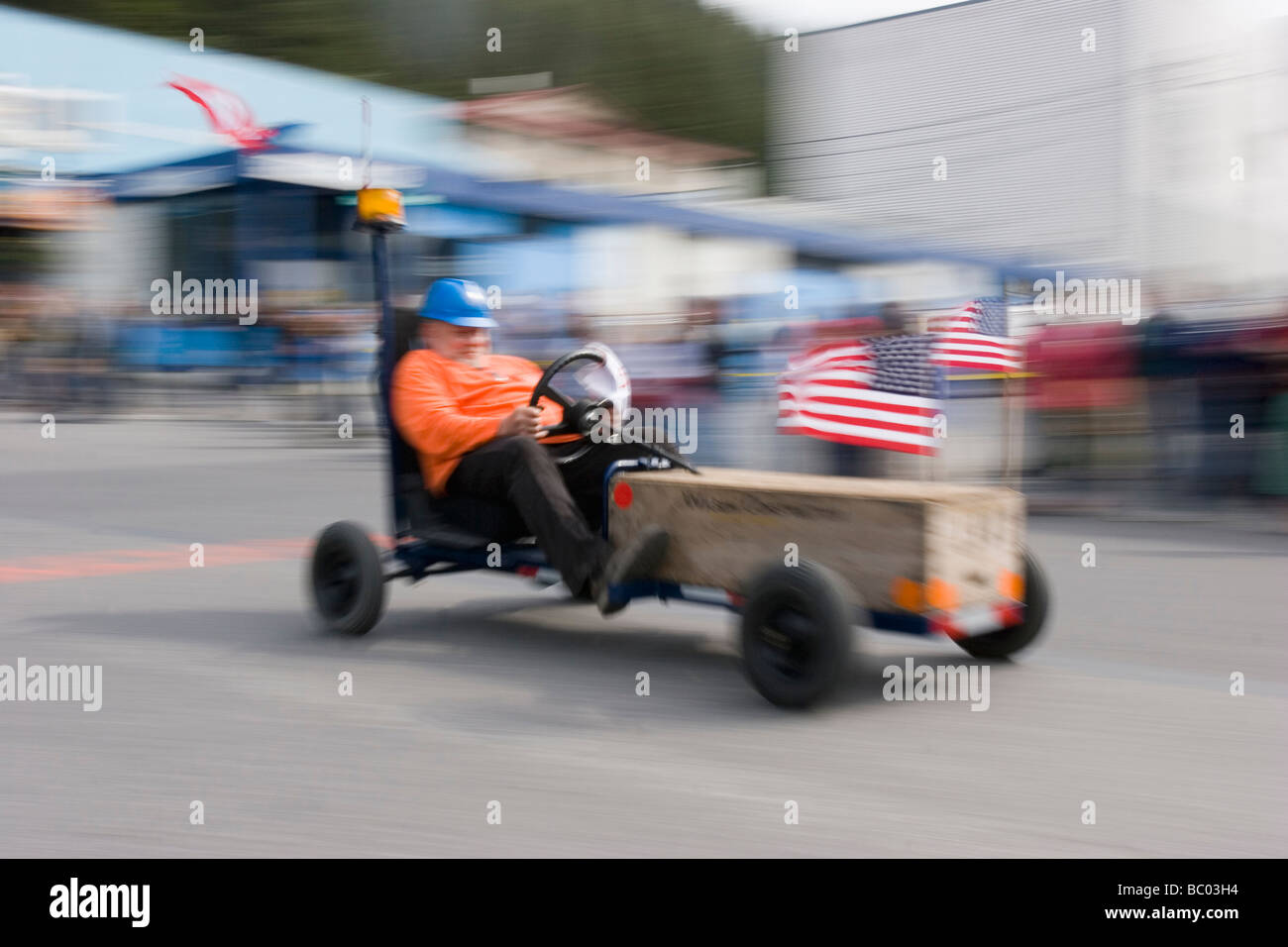 A man races his fancy soap box racer, 4th of July celebrations, Cordova ...