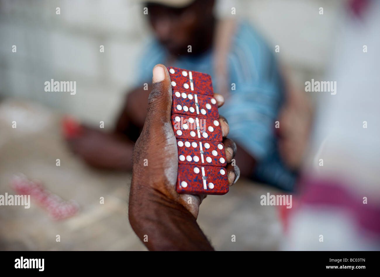 Men play dominoes in Cap Haitien, Haiti Stock Photo - Alamy