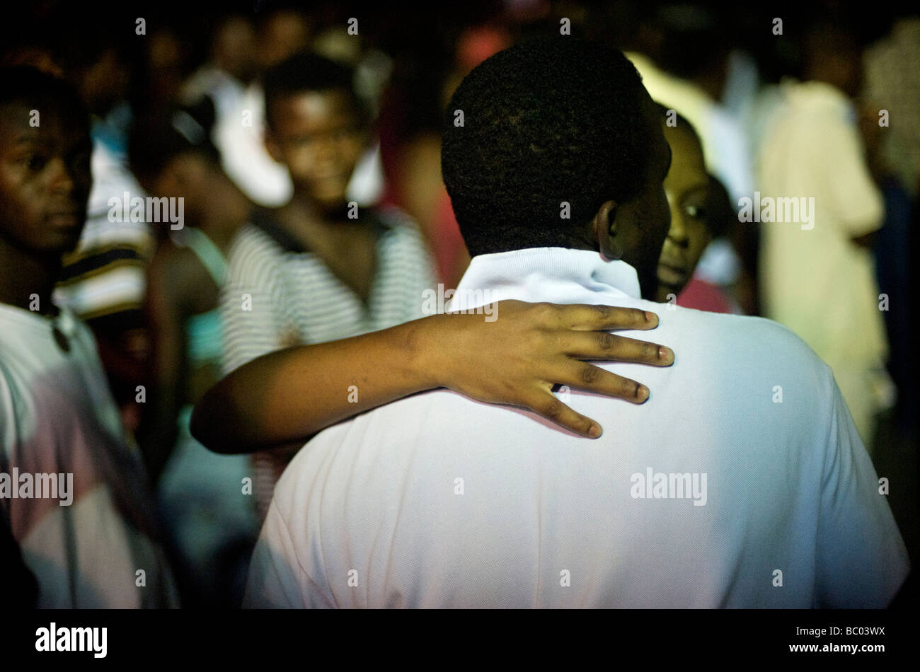 Haitian youth party at a ti sourit, or block party, in Port-au-Prince ...