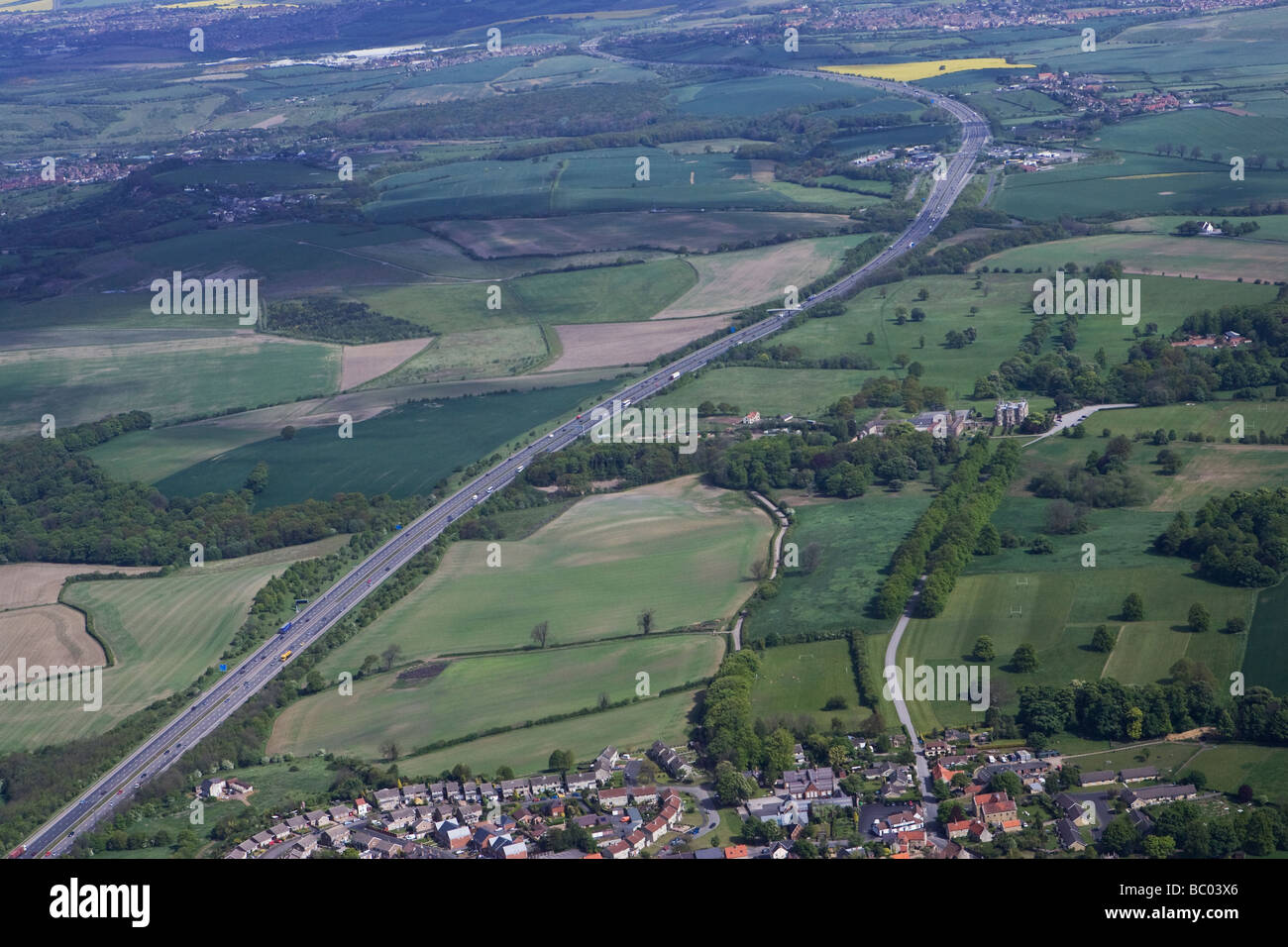 High level aerial view of M1 motorway at junction 31 in Derbyshire ...